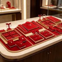 China Lockable Jewelry Display Table with Built-in LED Strip Lighting Velvet Lined Drawers and Rust-proof Gold Metal Frame for sale