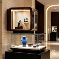 China Velvet Lined Jewelry Display Table with Built-in Dimmable LED Lighting and Rust-proof Gold Metal Frame for sale