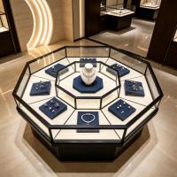 China Rust-proof Gold Metal Frame Jewelry Display Table with Built-in LED Strip Lighting and 4 Spacious Drawers for sale