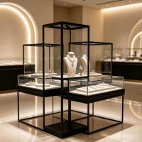 China Rust-proof Gold Metal Frame Jewelry Display Table with Built-in LED Strip Lighting and 4 Spacious Drawers for sale