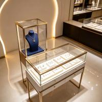 China Freestanding Island Display Cabinet with High CRI LED, Soft-Close Mechanism, and Luxury Blue Velvet Lining for sale