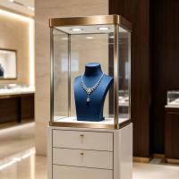 China Jewelry Display Table with Velvet Lined Drawers, Built-in Dimmable LED Lighting, and Rust-proof Gold Metal Frame for sale