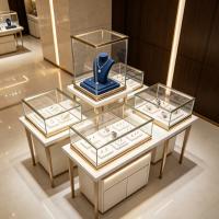 China Built-in Dimmable LED Lighting Jewelry Display Table with Solid Back Design and Tempered Glass Surface for sale