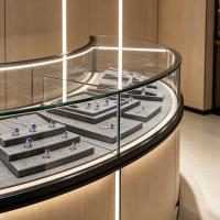 China Luxury Jewelry Display Setup with Calacatta Marble Top Customized Shelf Dimensions and LED Spot Lights for sale