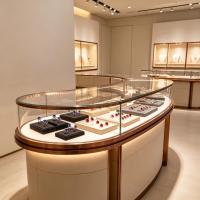 China Upright Display Case with Built-in High-CRI LED Lighting and Rose Gold Stainless Steel Frame Featuring Front Opening Soft-Close Mechanism for sale
