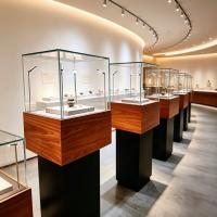 China Built-in LED Strip Lighting Jewelry Display Table with Velvet Lined Drawers and Rust-proof Gold Metal Frame for sale
