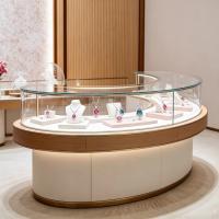 China Luxury Front Showcase with 5 Adjustable Glass Shelves, Secure Magnetic Lock, and Tempered Glass And Stainless Steel Construction for sale