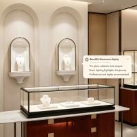 China Secure Key Lock Jewelry Counter with Marble Tabletop and Hidden LED Strip Lighting for Retail Stores for sale