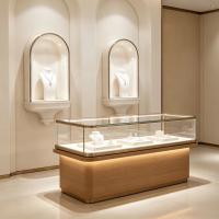 China Secure Key Lock Jewelry Counter with Marble Tabletop and Hidden LED Strip Lighting for Retail Stores for sale