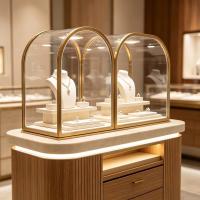 China 360° Panoramic Island Display Cabinet Featuring Customized Shelf Dimensions Glass Doors With Metal Handles Ideal For Storefront Displays for sale