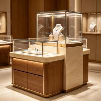 China Wall Mounted Display Case with 3 Adjustable Shelves, Top-mounted LED Spotlights, and Durable Powder Coated Finish for sale