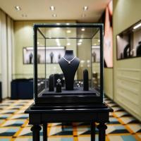 China Wall Mounted Display Case with 50kg Per Shelf Capacity, Front Opening Soft-Close Doors, and Top LED Spotlights And Strip Lighting for sale