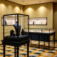 China Wall Mounted Display Case with 50kg Per Shelf Capacity, Front Opening Soft-Close Doors, and Top LED Spotlights And Strip Lighting for sale