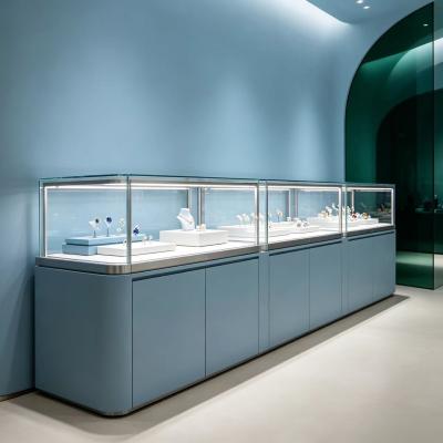 China Built-in CRI LED Lighting Upright Display Case with Adjustable Glass Shelves and Black Frame With Clear Glass for sale