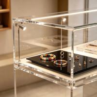 China Solid Wood Island Display Cabinet with Stainless Steel Durable Base and Curved Island Design for Retail Spaces for sale