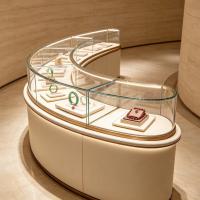 China Customized Jewelry Shop Design with Calacatta Marble Top and Ample Hidden Cabinets Storage Capacity for Jewelry Store Interior for sale