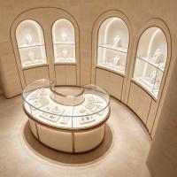 China Customized Jewelry Shop Design with Calacatta Marble Top and Ample Hidden Cabinets Storage Capacity for Jewelry Store Interior for sale