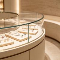 China Customized Jewelry Shop Design with Calacatta Marble Top and Ample Hidden Cabinets Storage Capacity for Jewelry Store Interior for sale