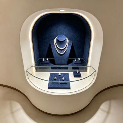 China Jewelry Shop Design with Calacatta Marble and White And Gold Finish Featuring Ample Hidden Cabinets for Jewelry Store Layout for sale