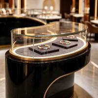 China Jewelry Shop Design with Ample Hidden Cabinets and Calacatta Marble Top in White and Gold Color Scheme for Jewelry Store Interior for sale
