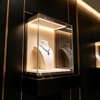 China Jewelry Shop Design with Ample Hidden Cabinets and Calacatta Marble Top in White and Gold Color Scheme for Jewelry Store Interior for sale