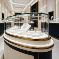 China Calacatta Marble Top Jewelry Shop Design with Ambient and Accent Lighting and Ample Hidden Cabinets for Jewelry Store Layout for sale