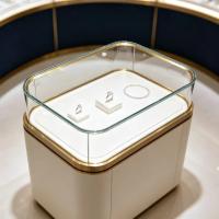 China Calacatta Marble Top Jewelry Shop Design with Ambient and Accent Lighting and Ample Hidden Cabinets for Jewelry Store Layout for sale