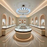 China Aluminium Frame Material Jewelry Shop Design with Calacatta Marble Top and Large Secure Cabinets for Jewelry Store Layout for sale