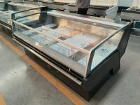 China Curved Glass Self Service Refrigerated Display Counter Commercial Deli Food Chiller for sale