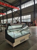 China Curved Glass Door Fresh Meat Case with Back Storage Cabinet and Inside Second Glass Shelf for sale
