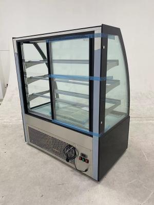 China Curved Glass Cake Display Fridge with Triple Glazed Anti-Fog Glass R290 Refrigerant and Digital Dixell Thermostat for sale