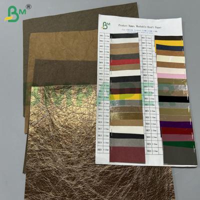 China 0.55mm 0.8mm 150cm Width Color Gold Brown Crumpled Jacron Paper For Women Bags for sale