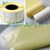 China Yellow Sticker Silicone Coated Label Glassine Paper Jumbo Rolls for sale