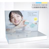 China Supermarket Makeup Display Stand Acrylic Cosmetic Display with White Display Risers for sale
