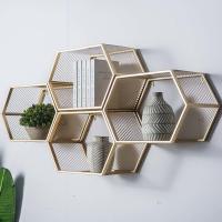 China Contemporary Design Style Metal Hexagon Wall Shelf for Wall Mount Storage for sale
