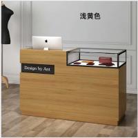 China Retailer Shops Modern Wood MDF Checkout Reception Desk with Glass Box Checkout Counter for sale