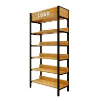 China Convenience Retail Store Modern Wooden LED Light Display Stand with Shelves and Cabinets for sale