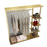 China Commercial Sectional Display Furniture Gold Clothing Rack with Shelves and Wheels for sale