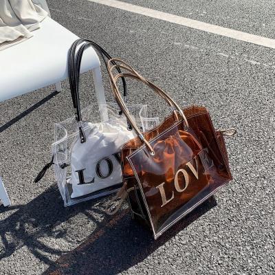 China Summer Transparent Jelly Bag Female Large Capacity All-Match Single Shoulder Bag Texture Portable Commuter Tote Bag for sale