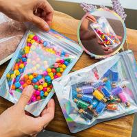 China Clear Front Foil Back Iridescent Food Zip Lock Bags Resealable Holographic Stand Up Pouches Smell Proof Mylar Bags for sale