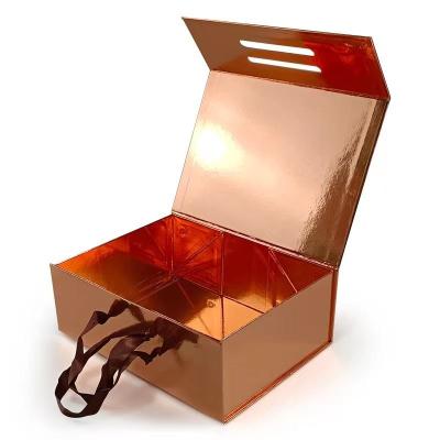 China Luxury Customize Logo Printed Magnetic Gift Box With Ribbon Handle Folding Apparel Gift Box with Ribbon for sale