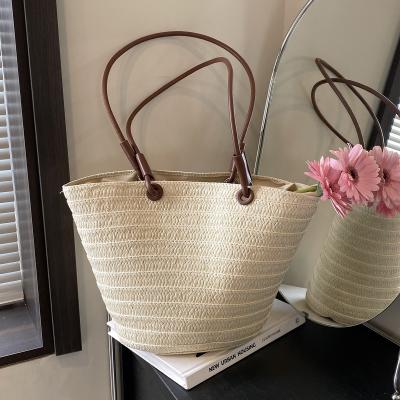 China Crochet Straw Raffia Tote Bag Handmade Luxury Tote Handbag Beach Bag Handle Raffia Straw Bag Eco-Friendly New Design Crochet Tote Bag for sale