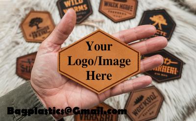 China Customized Stamping Logo Eco Friendly Embossed Leather Tags Leather Patch Sewing Iron On Leather Labels For Clothes Garment Hat for sale