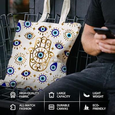 China Wholesale Women'S Printed Handbags, Tote Bags, Hot Selling Devil'S Eye Canvas Bag Handbag Shoulder Bag Large Capacity Beach Bag Turkish Eye Bag for sale