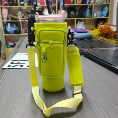 China Neoprene 40oz Water Bottle Carrier Bag With Shoulder Strap IPhone Pocket Water Bottle Holder Pouch Stanley Cup Accessories for sale