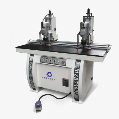 China Two-heads hinge boring machine MZ73032 for 35mm hinge holes with high precision track and 2840rpm spindle speed for sale