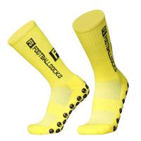 China Medium Thickness Anti Slip Rugby Socks With Round Silicone Suction Cup Grip for sale