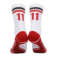 China Custom Woven Anti Slip Breathable Pattern Basketball Football Training Athletic Socks for sale