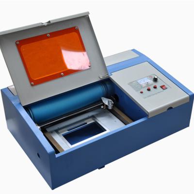 China 40W Small Laser Engraving Cutting Machine 30x20cm For Rubber Stamp for sale