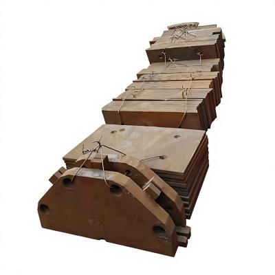 China Custom High Manganese Steel Wear Resistant Crusher Liner for Ball Mill & Grinding Mill for sale